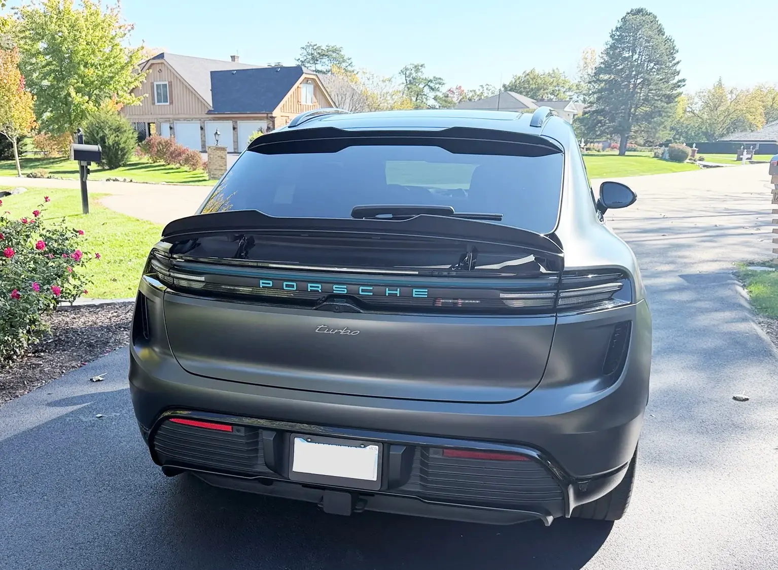 Gloss black upper and lower spoiler installed | Macan EV Forum, News ...